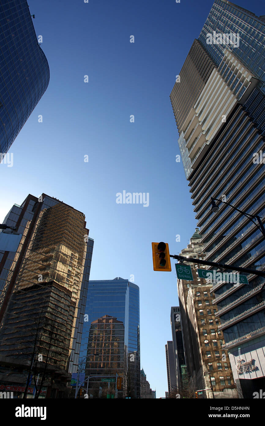 High rise buildings in front of blue sky in Downtown Vancouver, seen in ...
