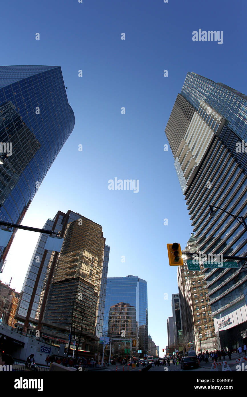 High rise buildings in front of blue sky in Downtown Vancouver, seen in ...