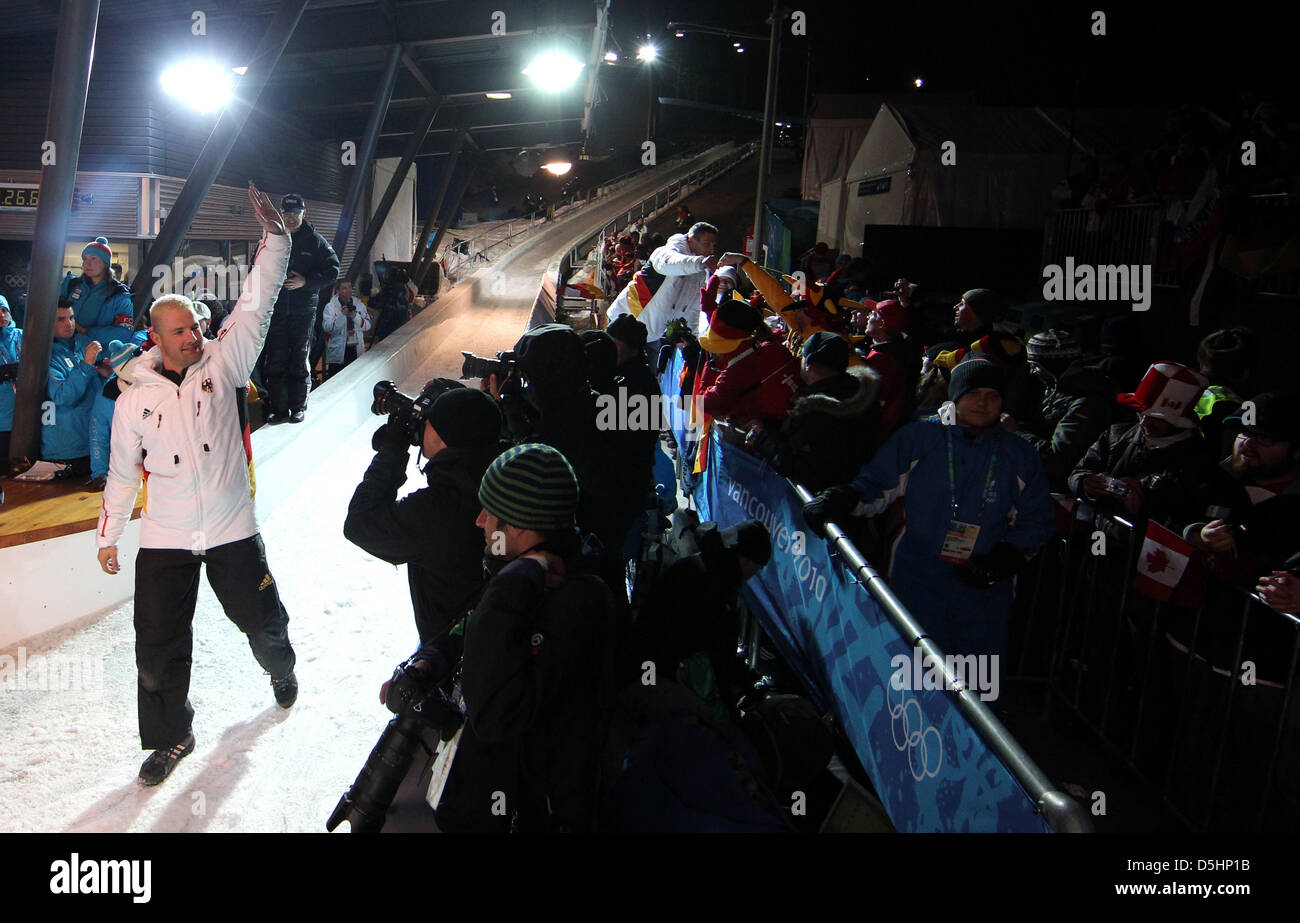 Andre Lange of Germany 1 celebrates after winning the men's two-man ...
