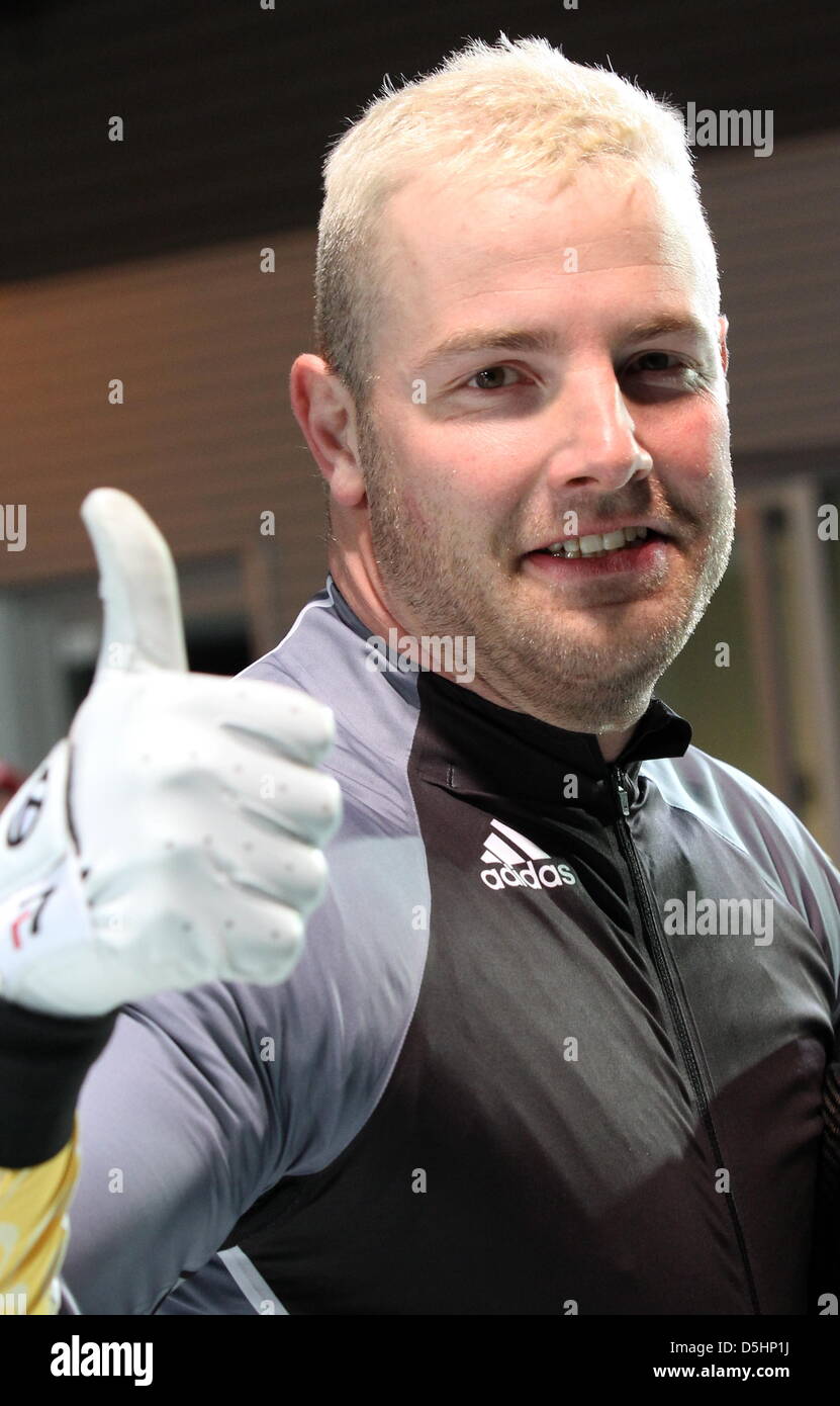 Andre Lange of Germany 1 celebrates after winning the men's two-man ...