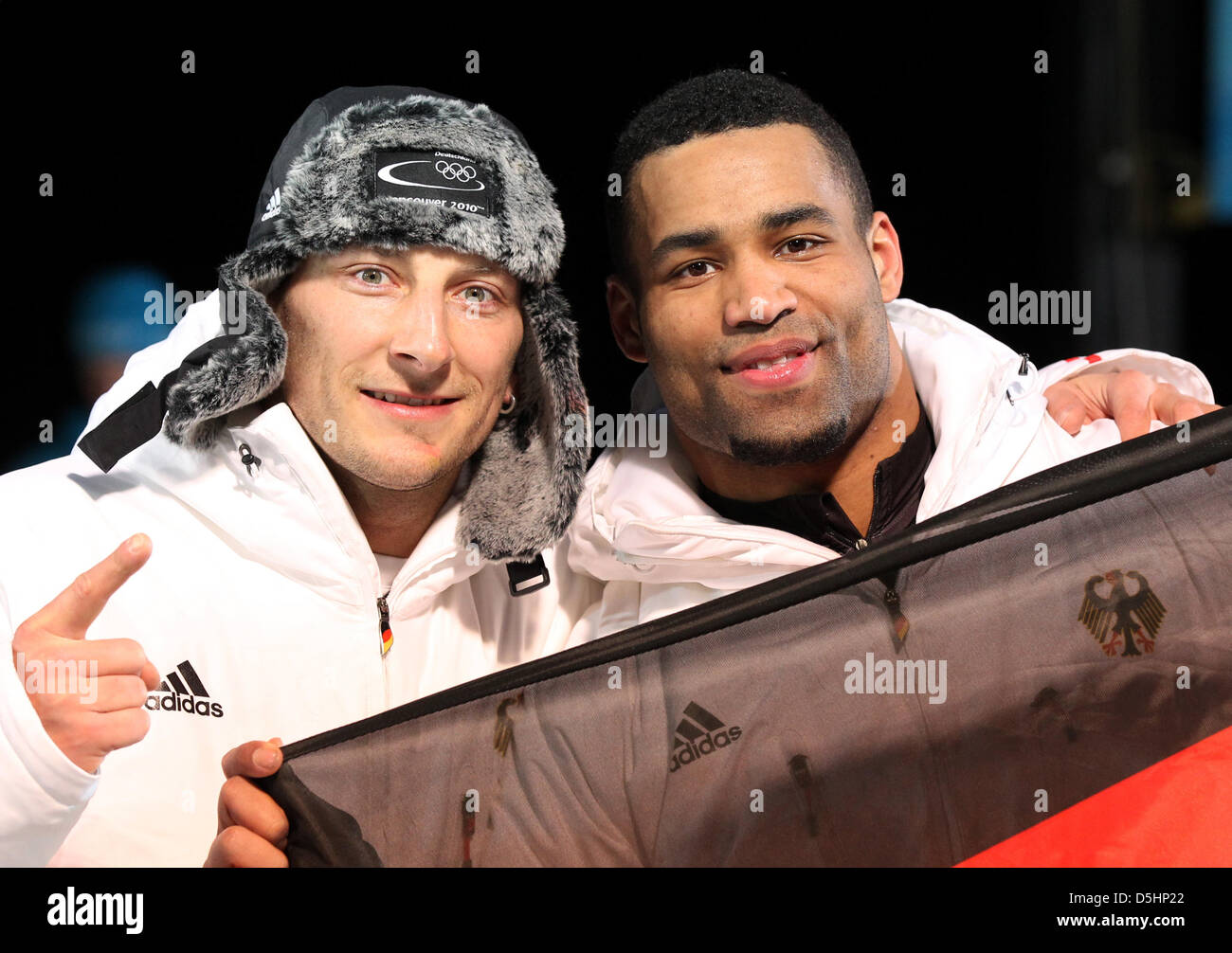 Second placed Thomas Florschuetz (L) and Richard Adjei of Germany-2 ...