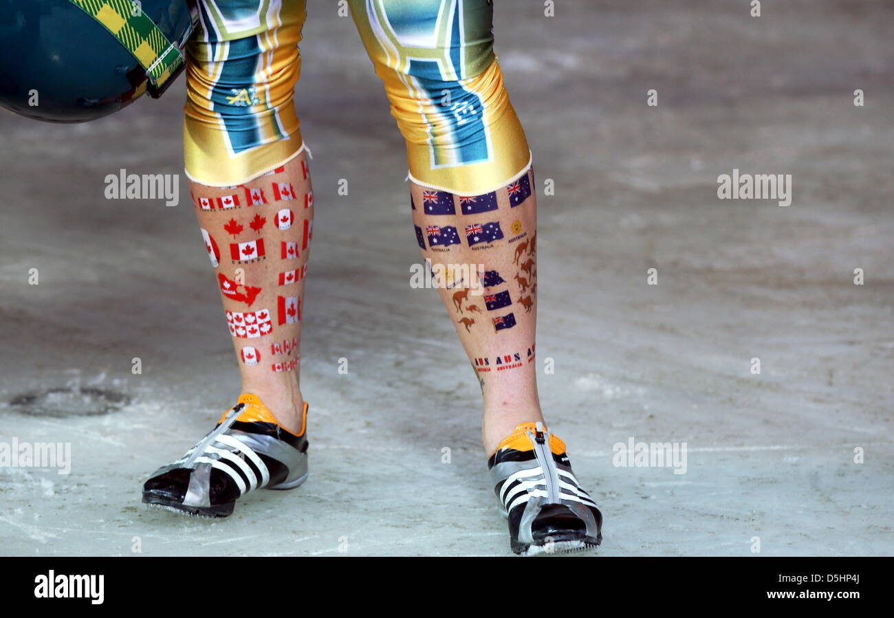 Bobsledder Christopher Spring of Australia has coverd his calves with ...