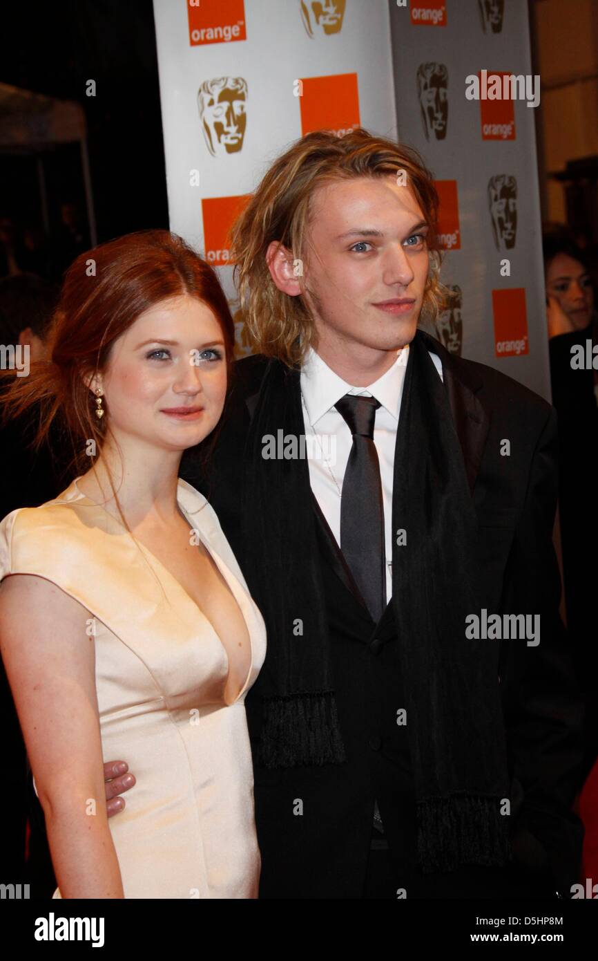 British actors Bonnie Wright (L) and Jamie Campbell Bower arrive for ...