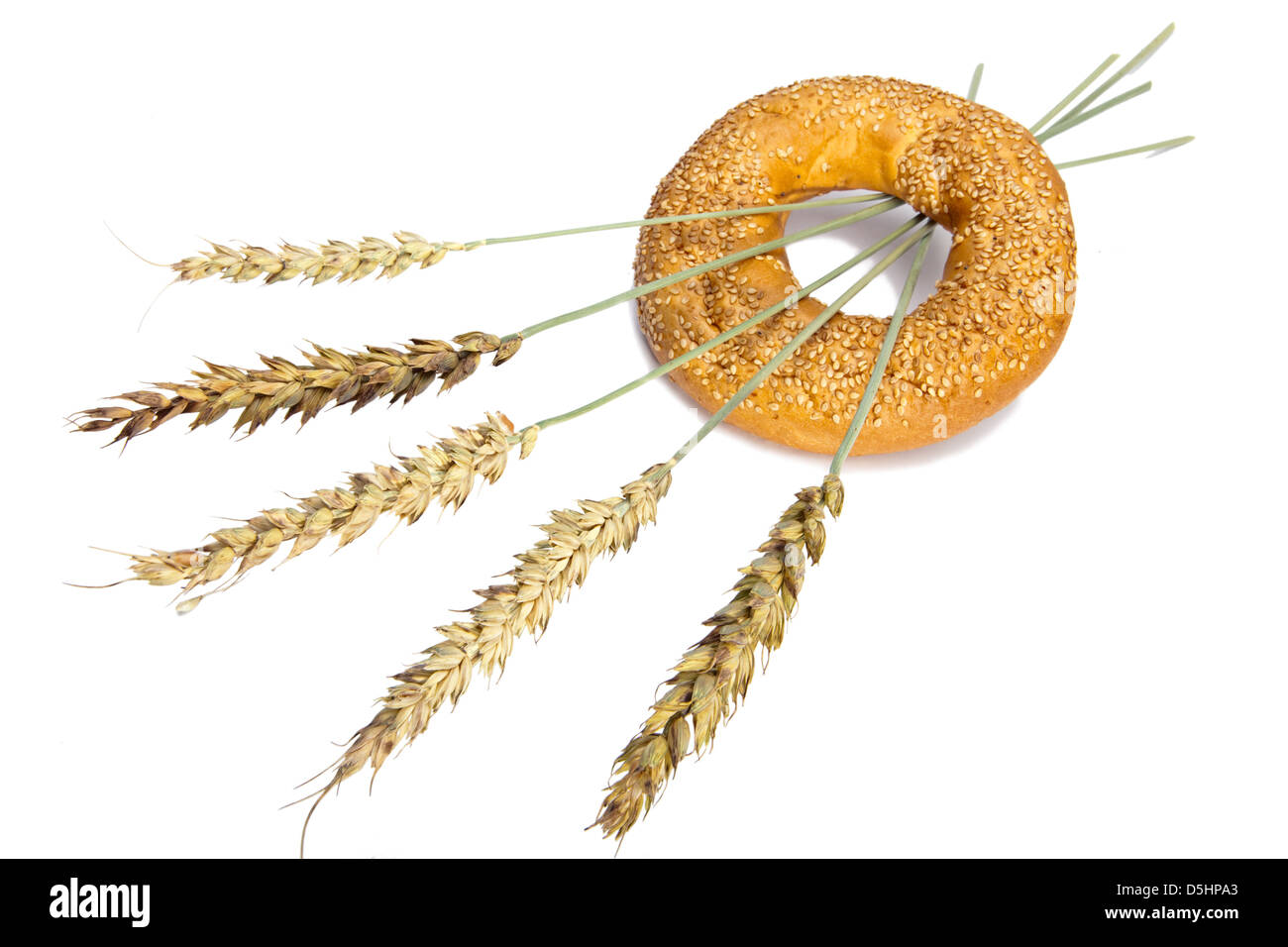 Wheat and bread on white background Stock Photo - Alamy