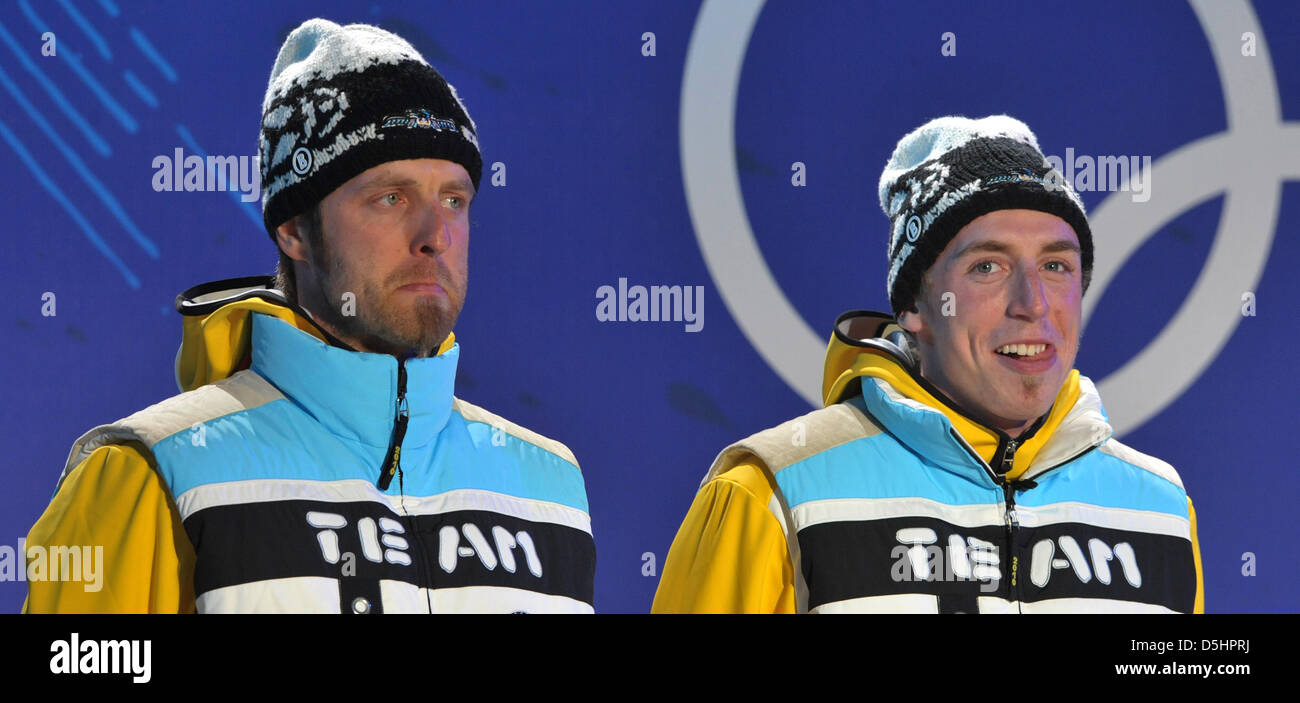 Silver medallists Tim Tscharnke (R) and Axel Teichmann of Germany ...