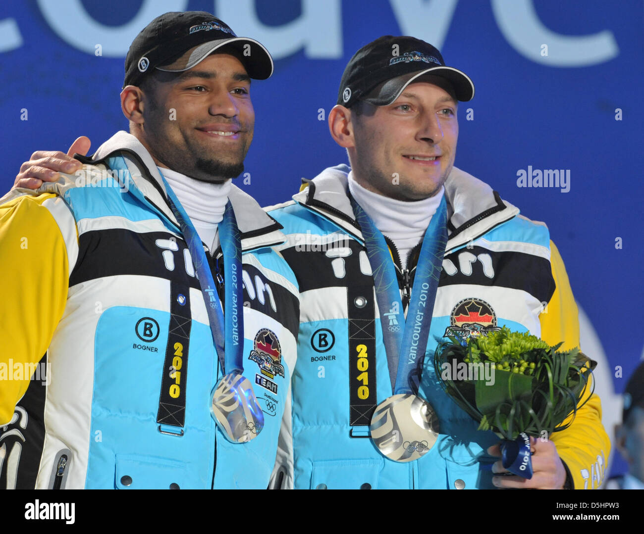 Silver medallists Thomas Florschuetz (R) and Richard Adjei of Germany ...