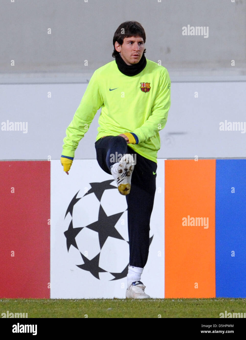 Lionel Messi, striker of Spanish soccer club FC Barcelona, warms up ...