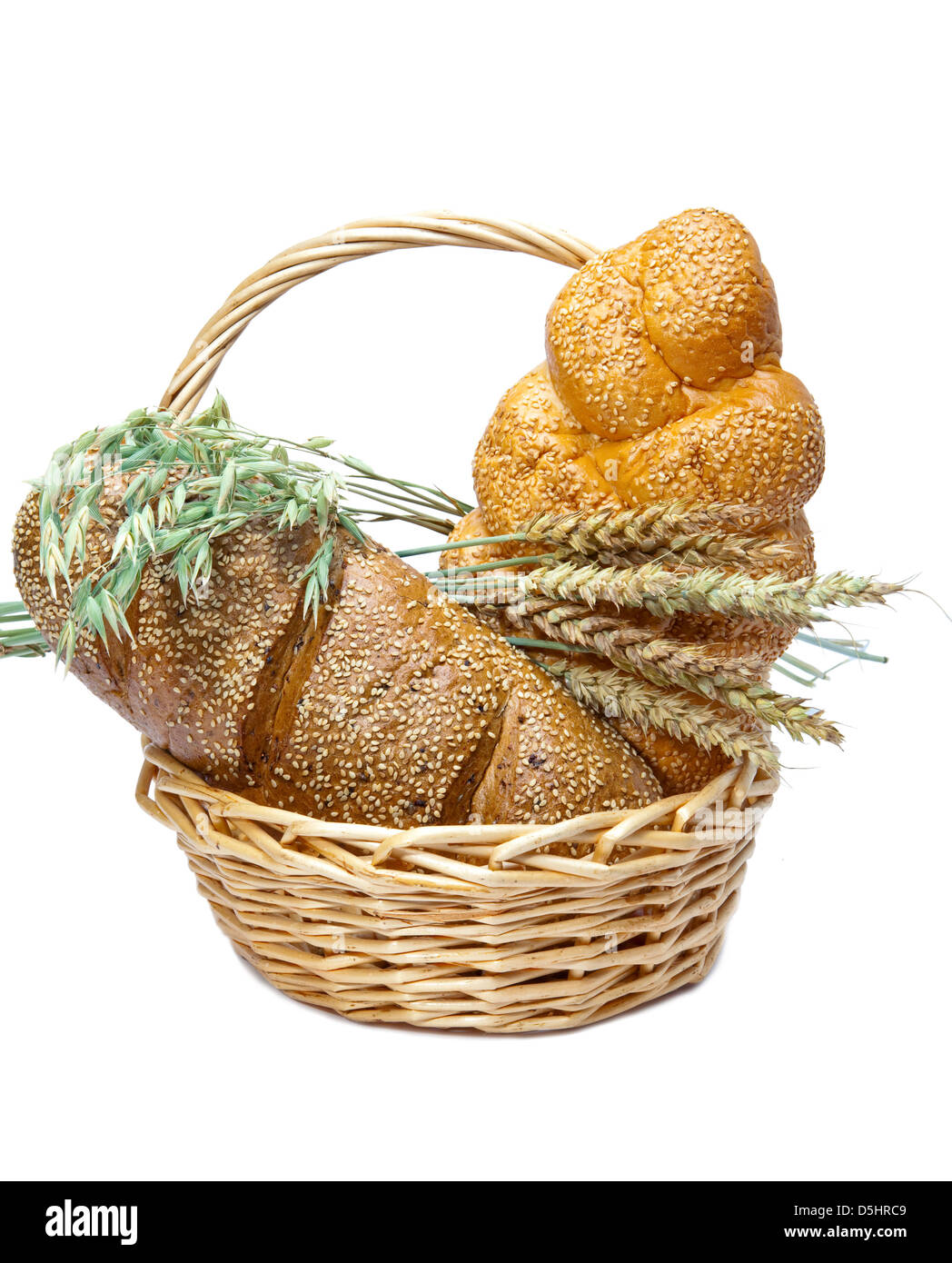 Basket with bread on white background Stock Photo - Alamy