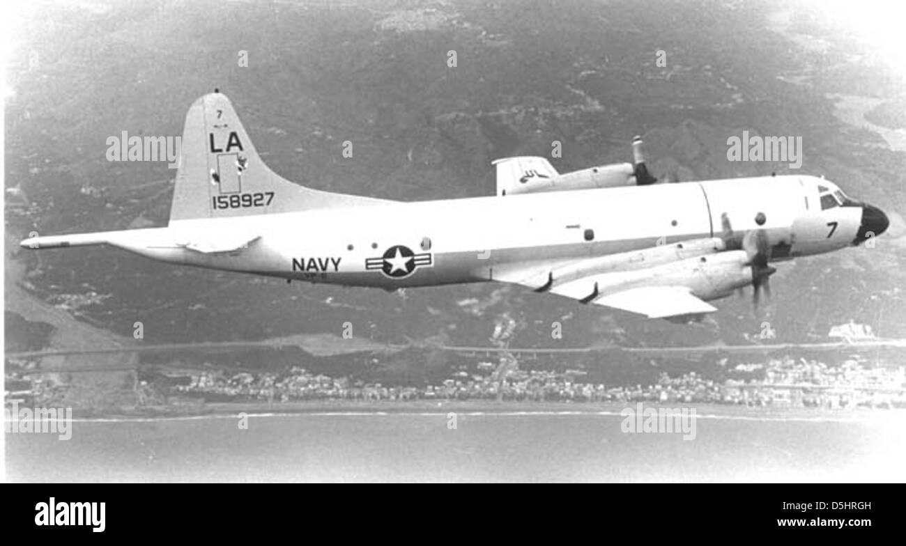 This photograph captures a VP-5 squadron Lockheed Orion aircraft in ...