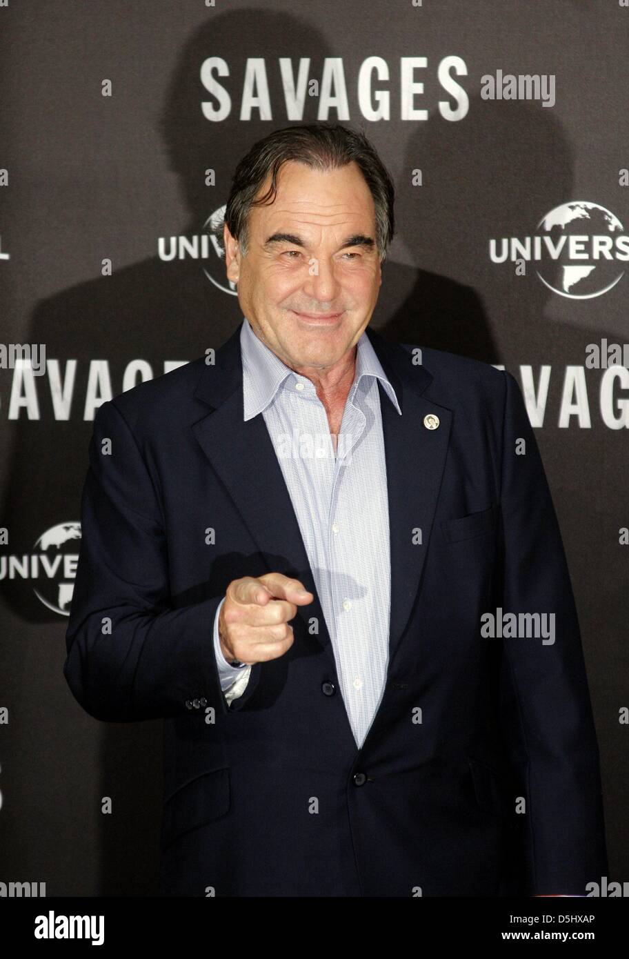 US director Oliver Stone arrives for the premiere of his movie 'Savages ...