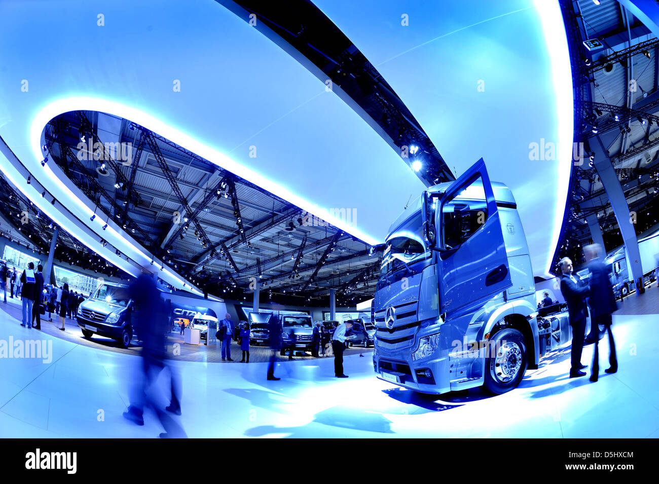 People visit the Mercedes-Benz booth at the International Motor Show ...