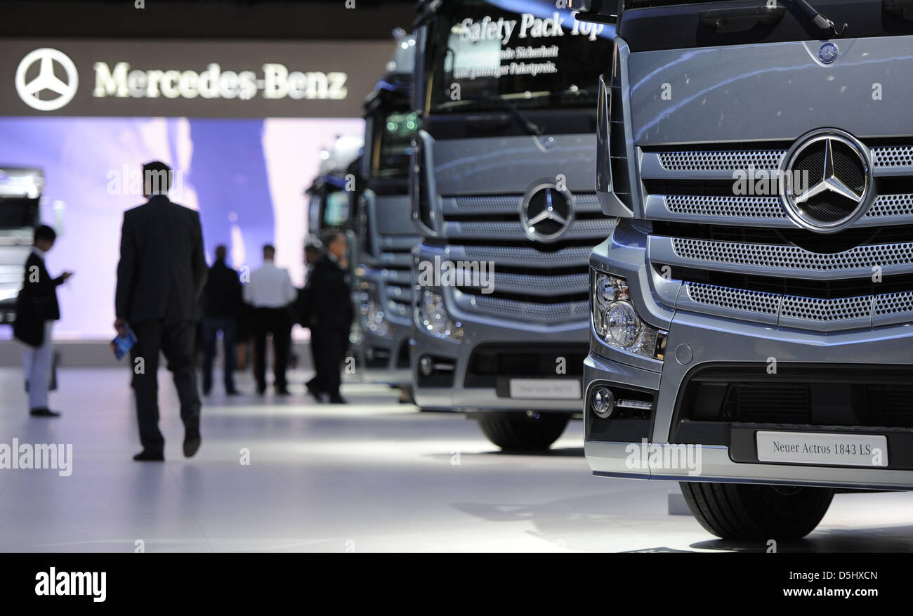 People visit the Mercedes-Benz booth at the International Motor Show ...