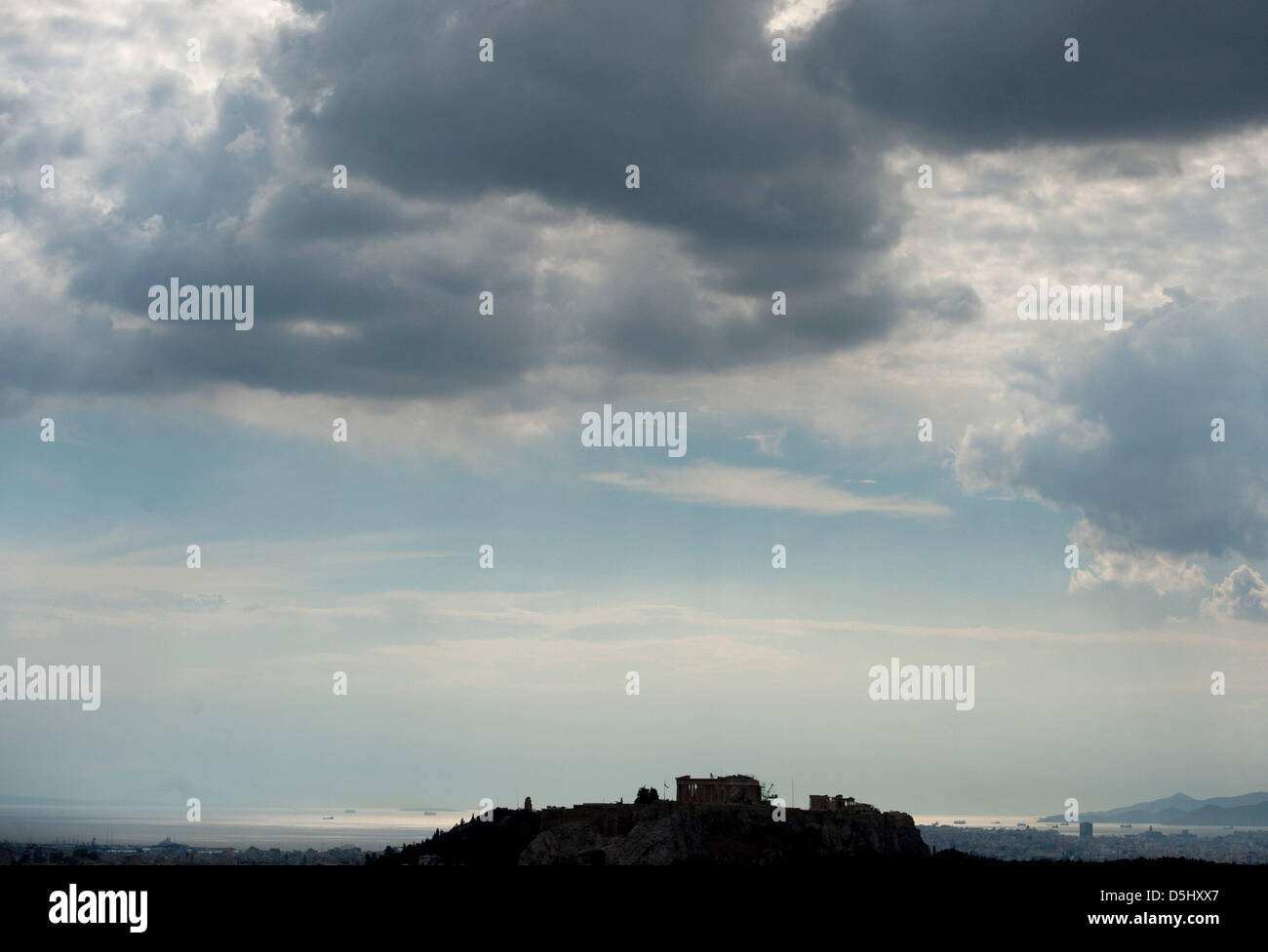 Dark clouds hang in the sky above the Acropolis in Athens, Greece, 18 ...