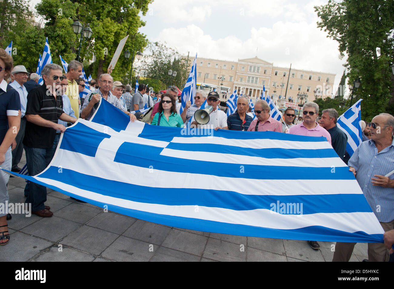 Former Greek military officers protest against the reduction of their ...