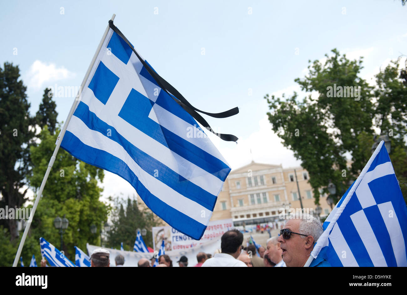 Former Greek military officers protest against the reduction of their ...