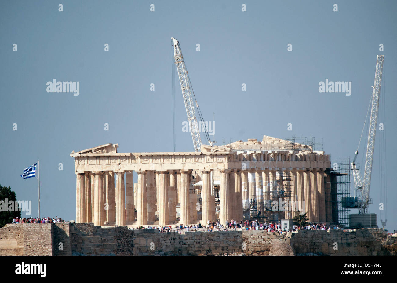Cranes stand next to the Parthenon at the Acropolis in Athens, Greece ...
