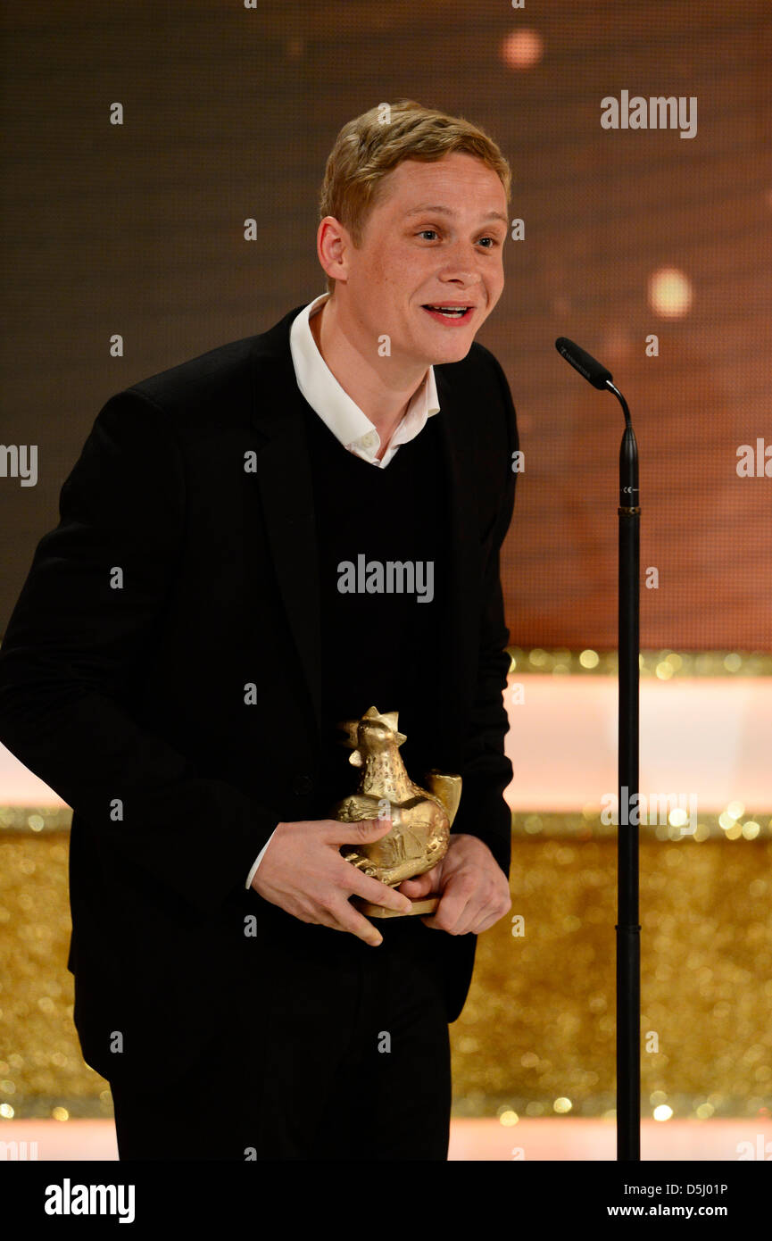 German actor Matthias Schweighoefer receives his award at the Golden ...