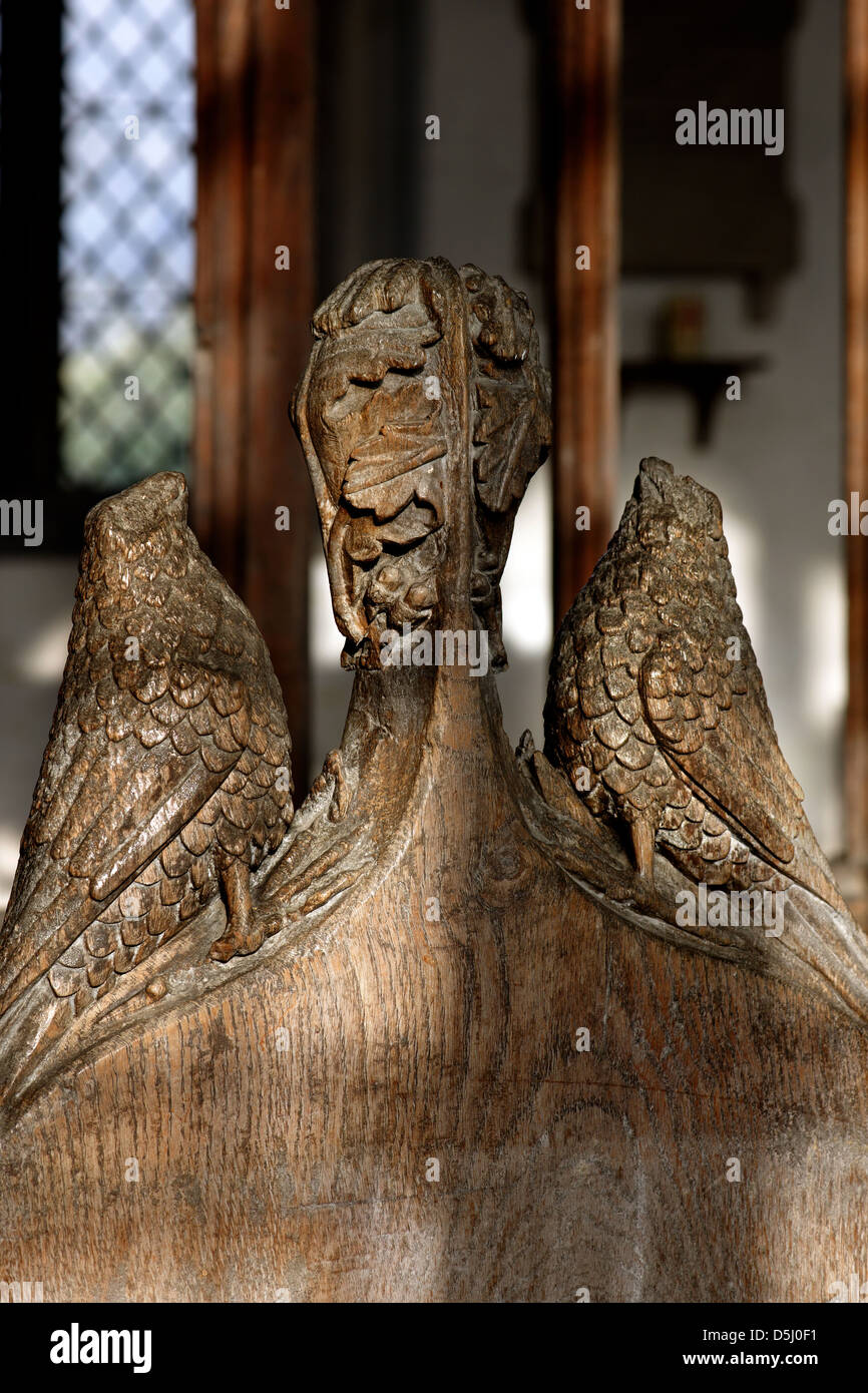 15th century poppy head finials on a pew end at St Giles Church, Holme ...