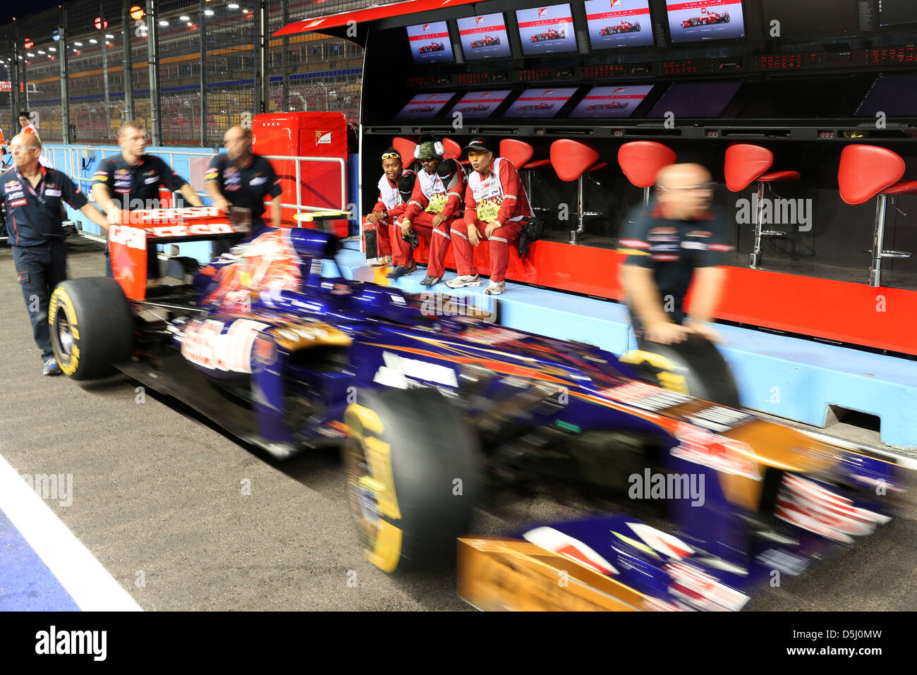 Mechanics of French Formula One driver Jean-Eric Vergne of Toro Rosso ...
