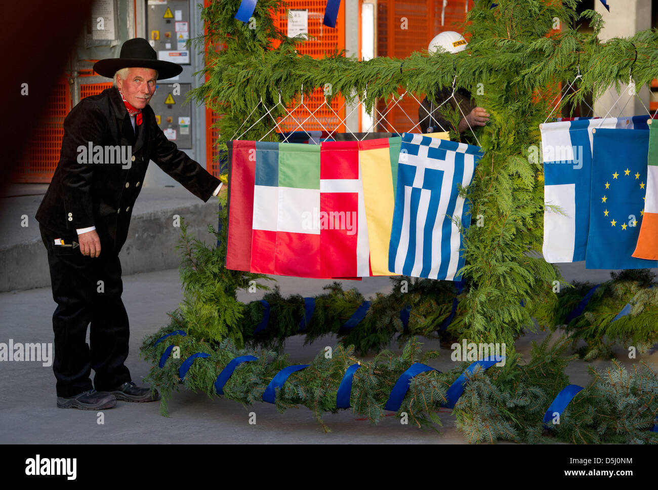 Flags of the Eu member states decorate the topping-out wreath for the ...