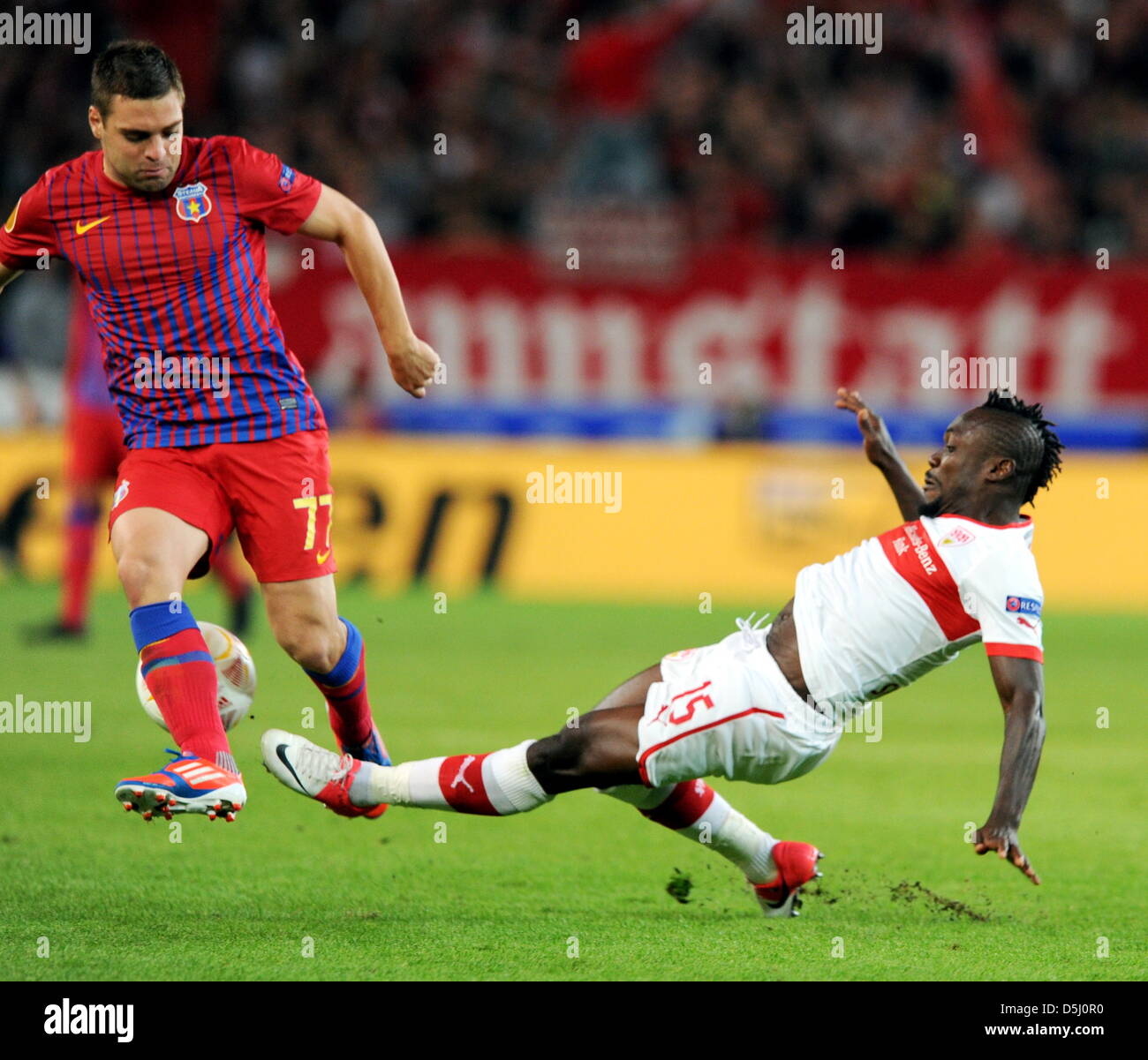 Stuttgarts Arthur Boka (r) and Adrian Popa of Bucharest vie for the ...