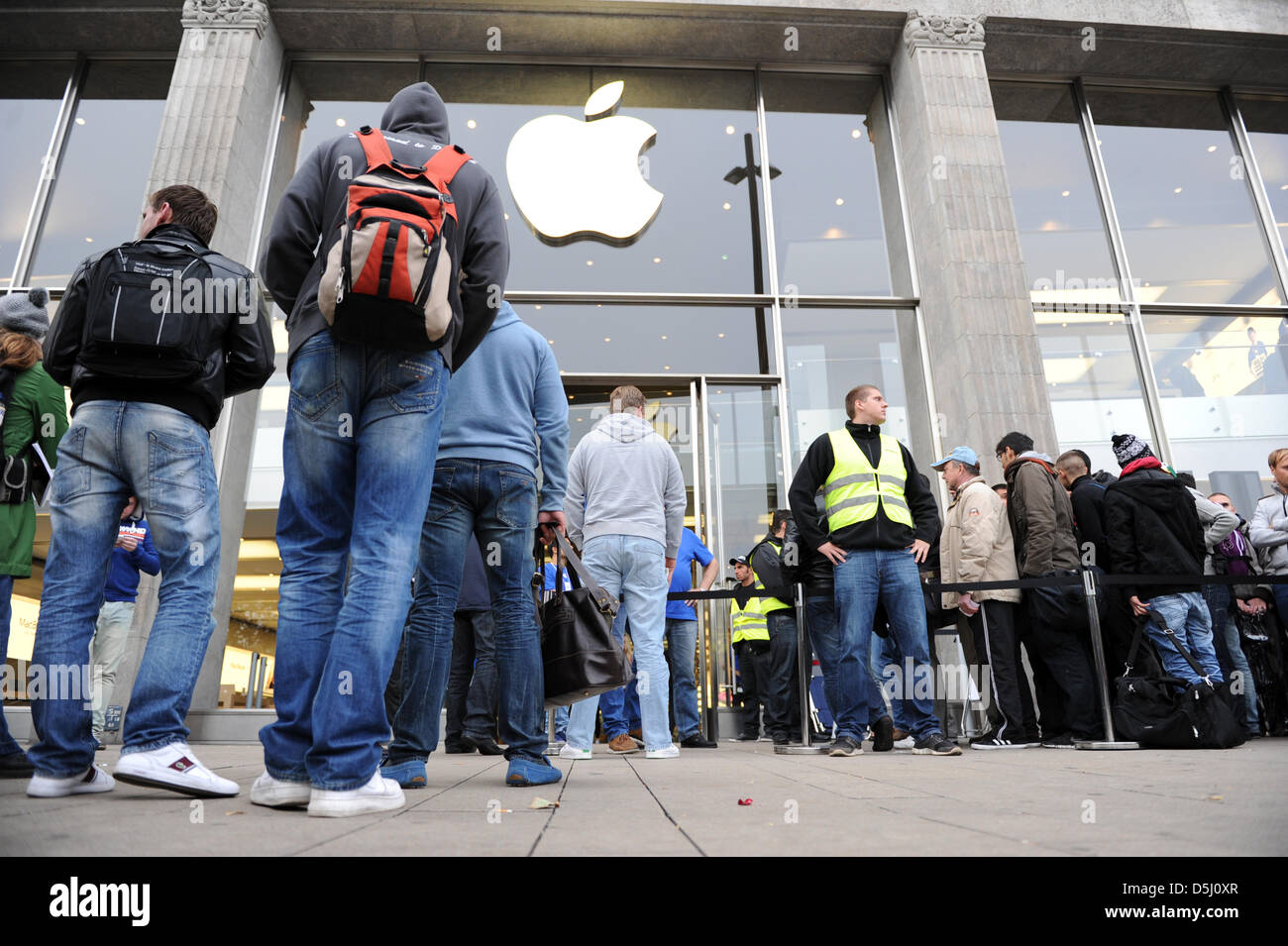 Fans of Apple wait for the sales launche of the iPhone 5 in front of an ...