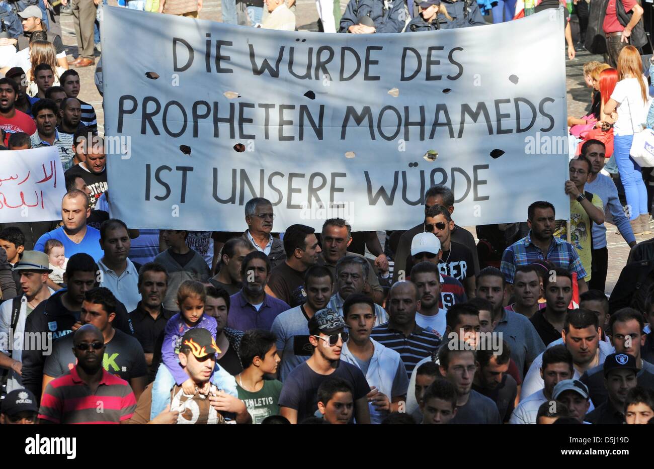 People protest against a controversial Islam video in Freiburg, Germany ...