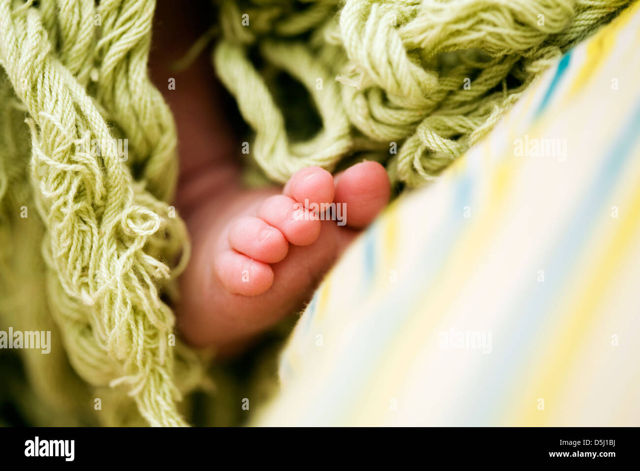 Tiny newborn baby foot hi-res stock photography and images - Alamy