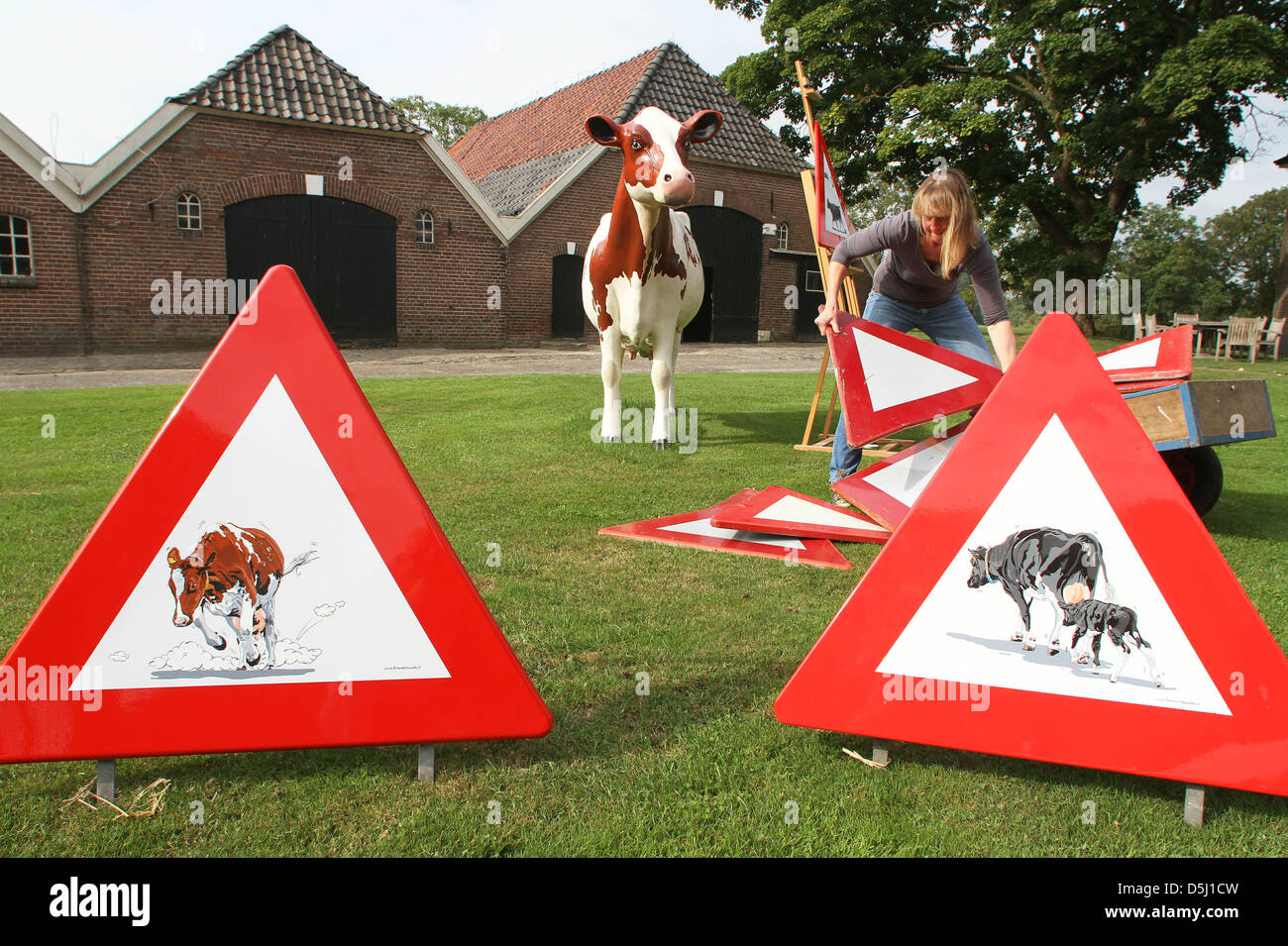 Tine van Houselt displays her self-made animal traffic signs in Laren ...