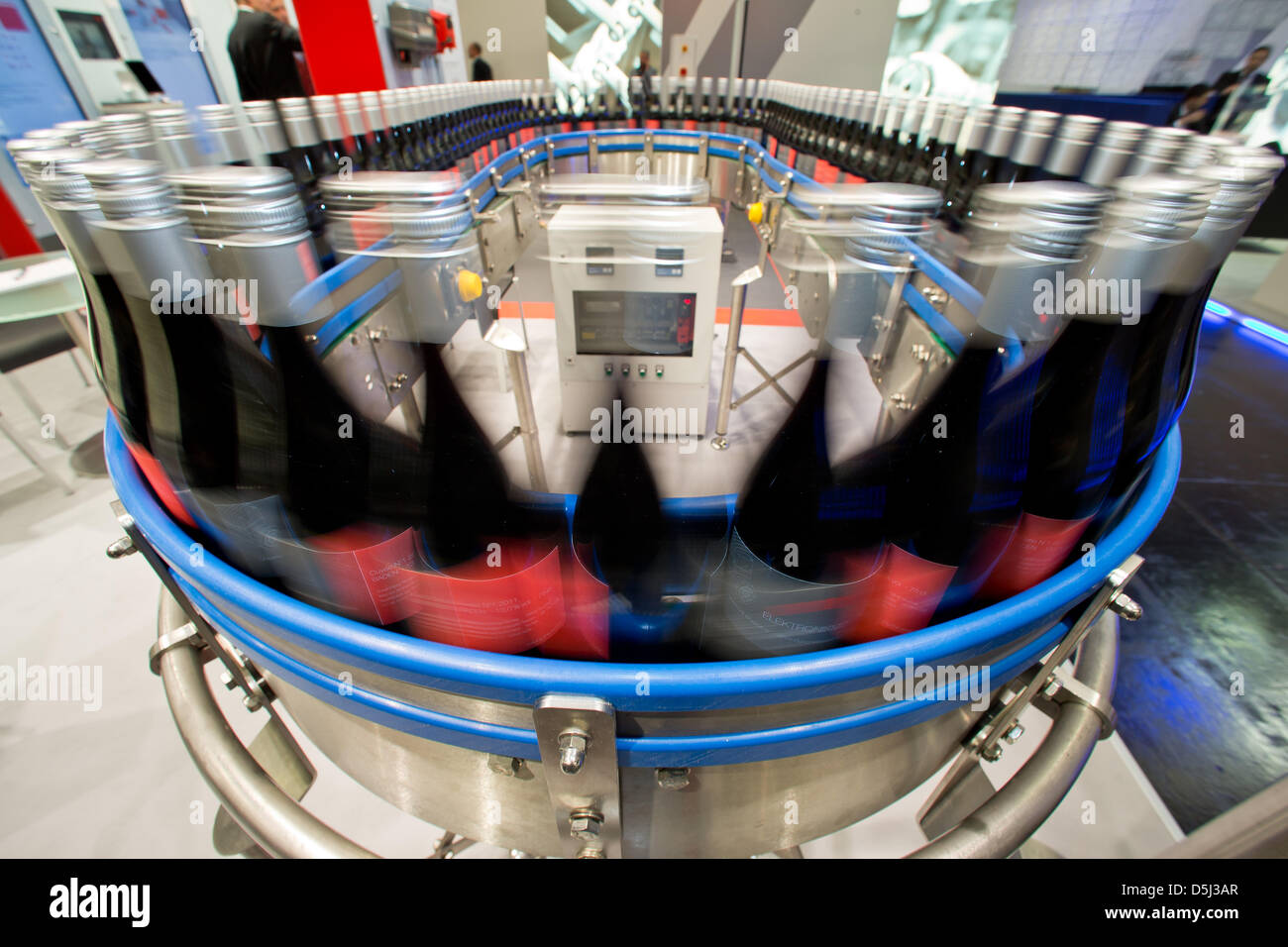 An assembly line for bottles is presented at the booth of the German ...