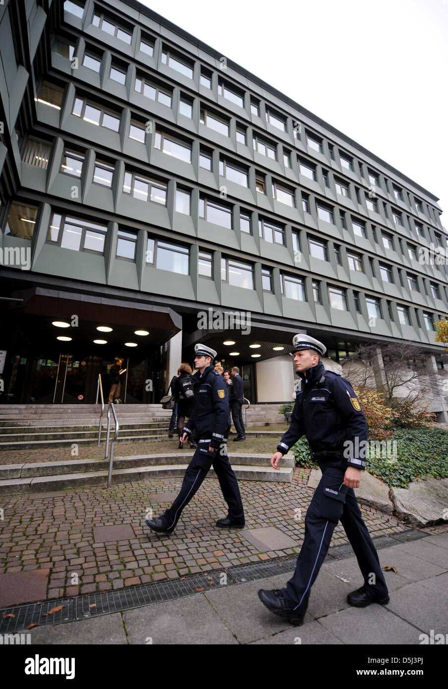 Police officers secure the area at the Regional Court in Stuttgart ...