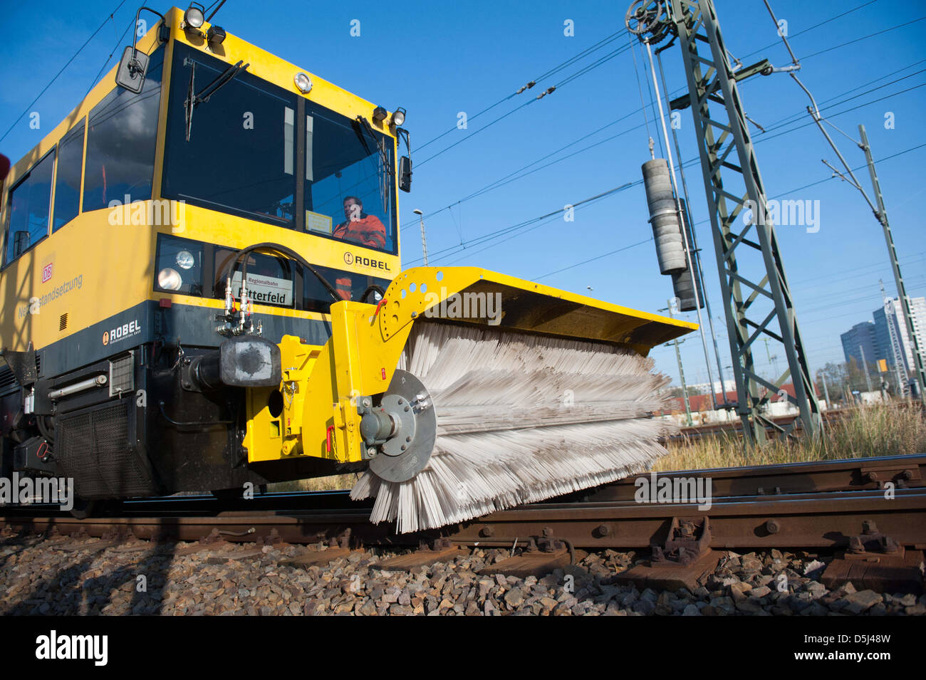 A rail vehicle with snow clearing equipment is presented in Berlin ...
