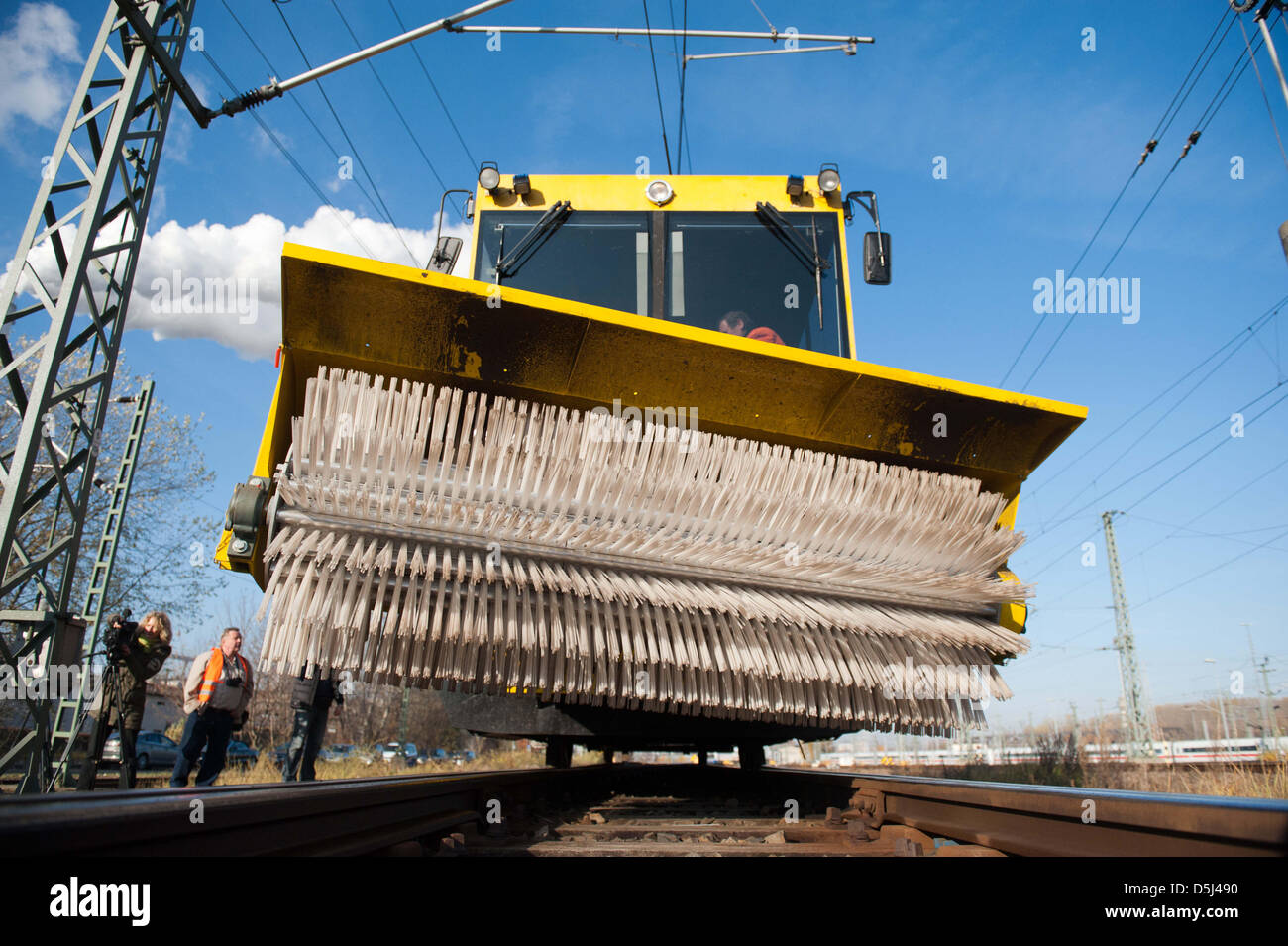 A rail vehicle with snow clearing equipment is presented in Berlin ...