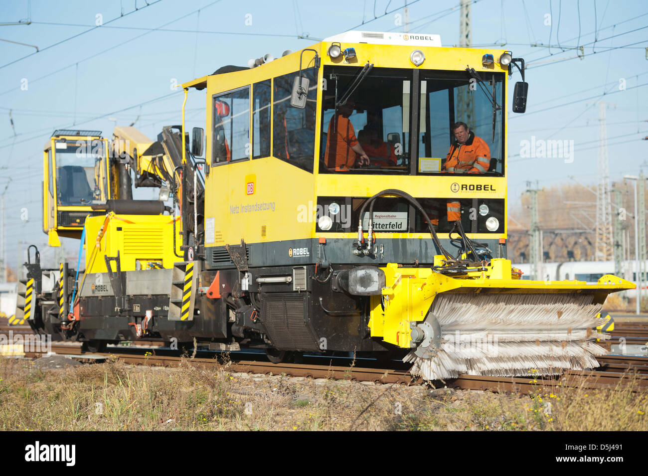 A rail vehicle with snow clearing equipment is presented in Berlin ...