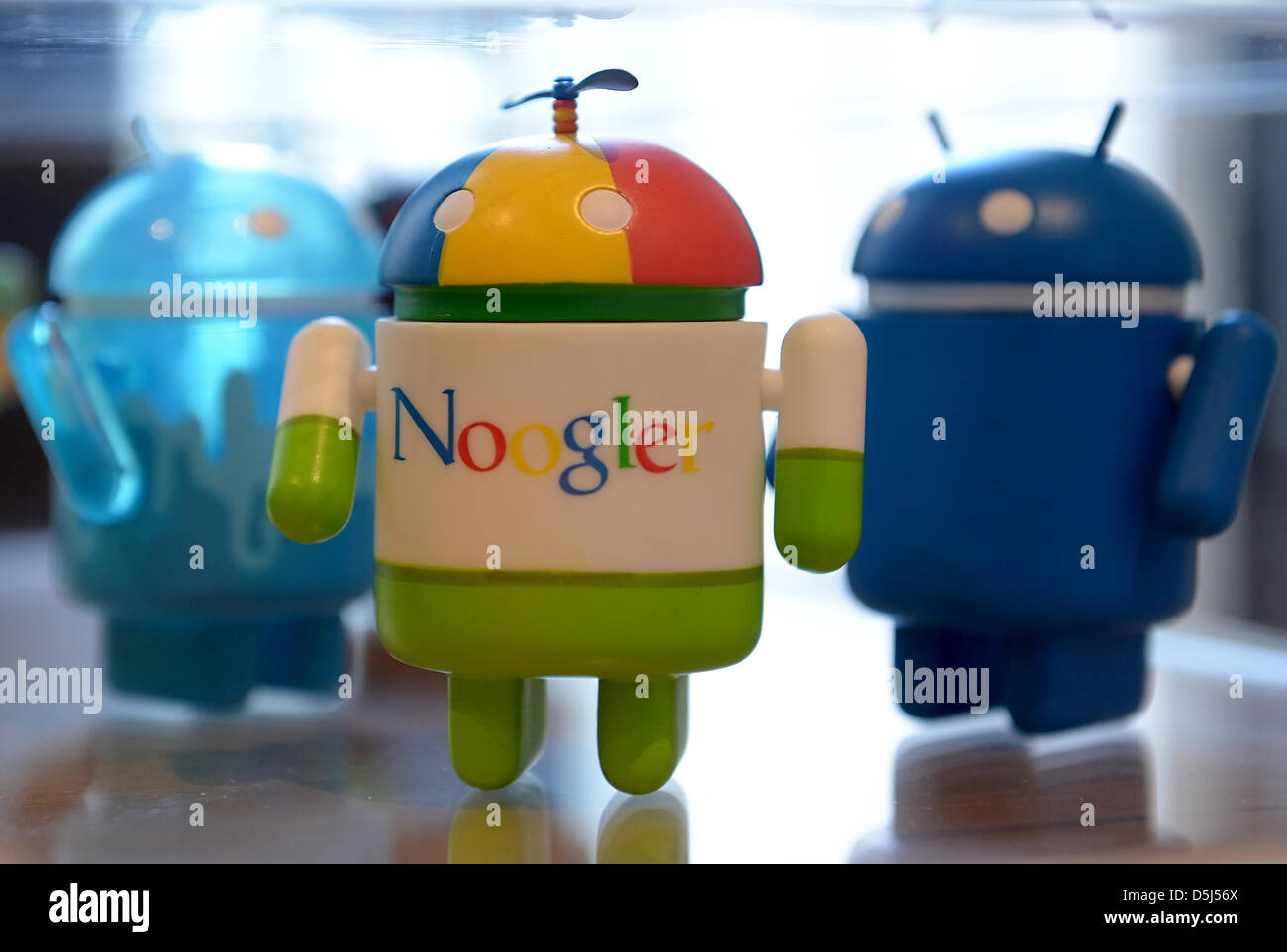 A colorful miniature Android toy is pictured in a glass cabinet at ...