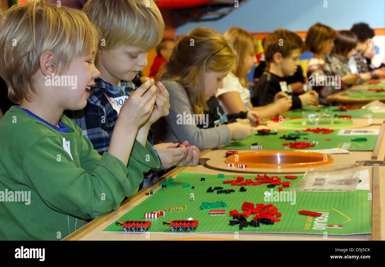 Children put Lego blocks together at Legoland Discovery in Berlin ...