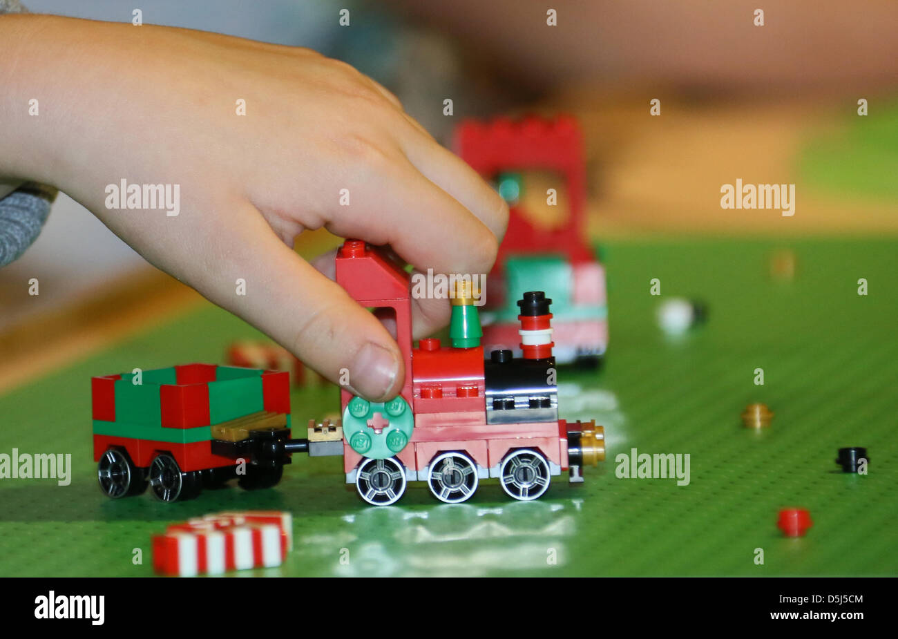 Children put Lego blocks together at Legoland Discovery in Berlin ...