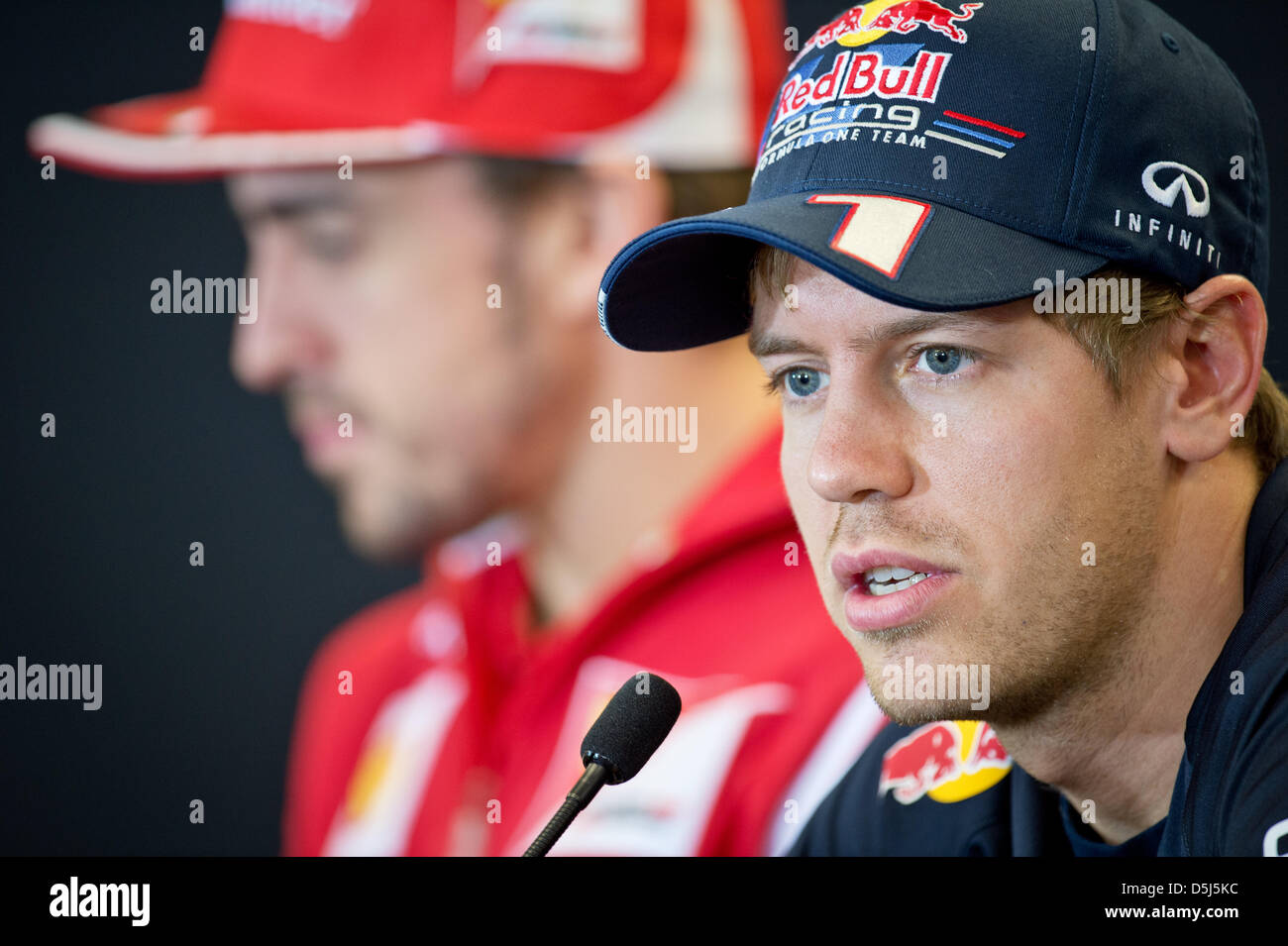 German Formula One driver Sebastian Vettel of Red Bull (R) and Spanish ...