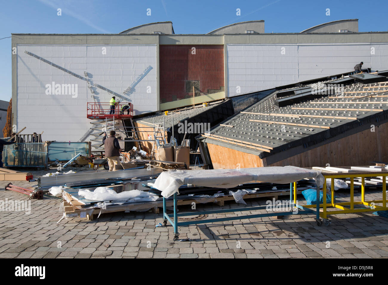 People work on the construction site of the Academy of the Jewish ...