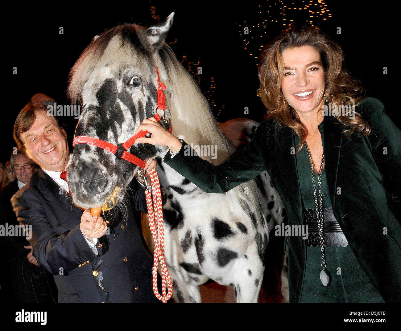 Founder of the estate Aiderbichl Michael Aufhauser (L) and entrepreneur ...