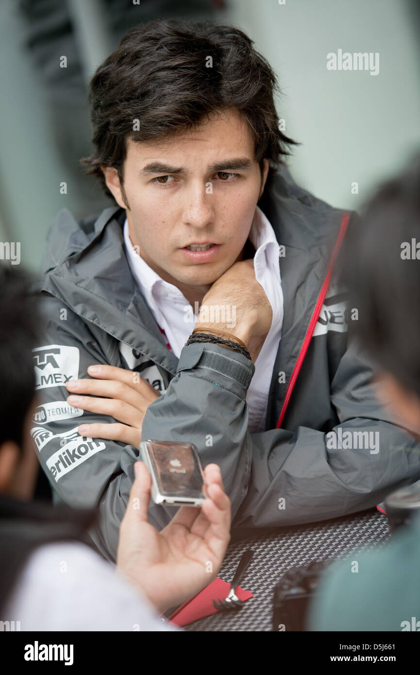 Mexican Formula One driver Sergio Perez of Sauber talks to journalists ...