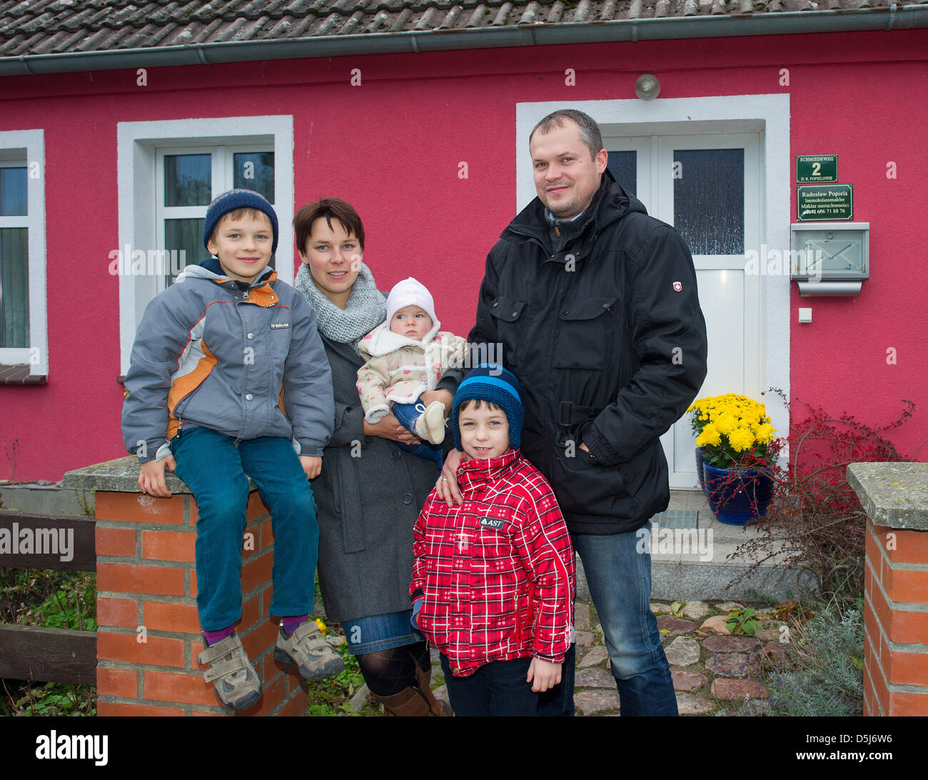 The Polish family Pupiela with father Radoslaw, mother Dominika and ...