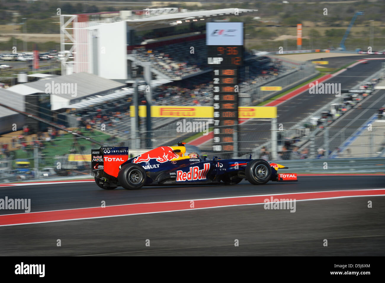 German Formula One driver Sebastian Vettel of Red Bull steers his car ...
