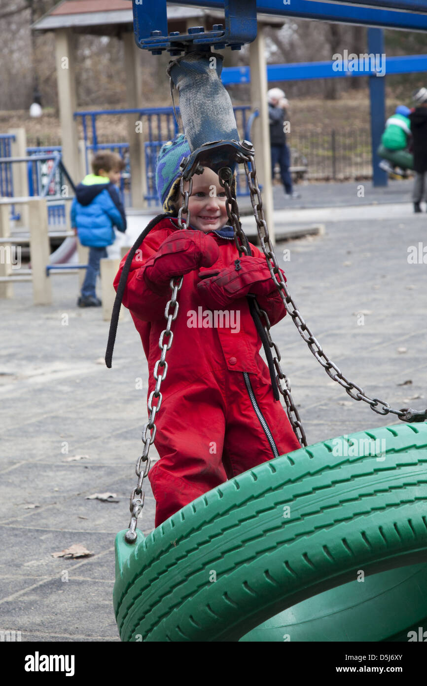 Boy with tire hi-res stock photography and images - Alamy