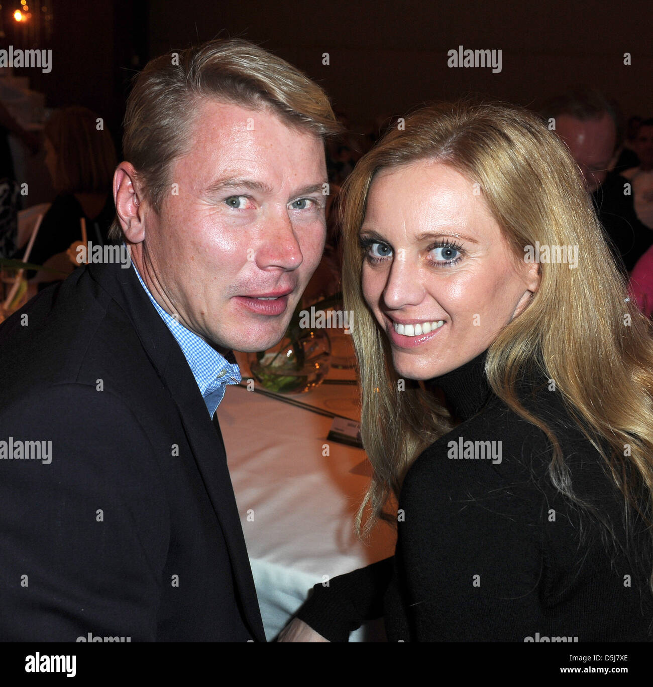 Former Finish race driver Mika Haekkinen (l) and his partner Marketa ...