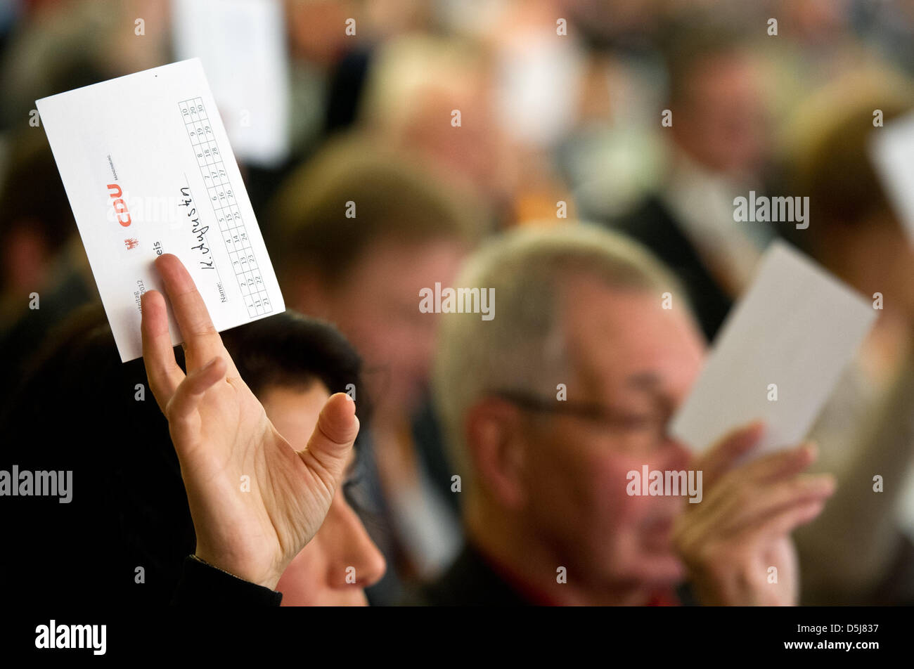Delegates vote during the Christian Democrats' Brandenburg state party ...