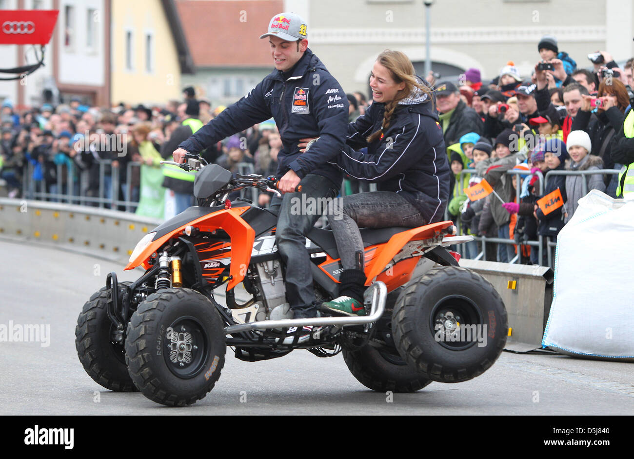 Moto3 world champion Sandro Cortese and his girlfriend Anna ride on a ...