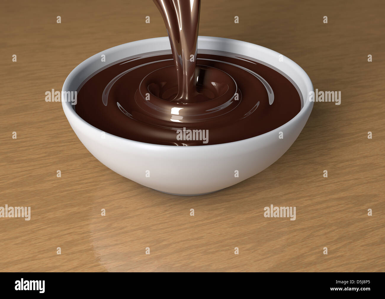 Liquid dark chocolate flowing in bowl Stock Photo - Alamy