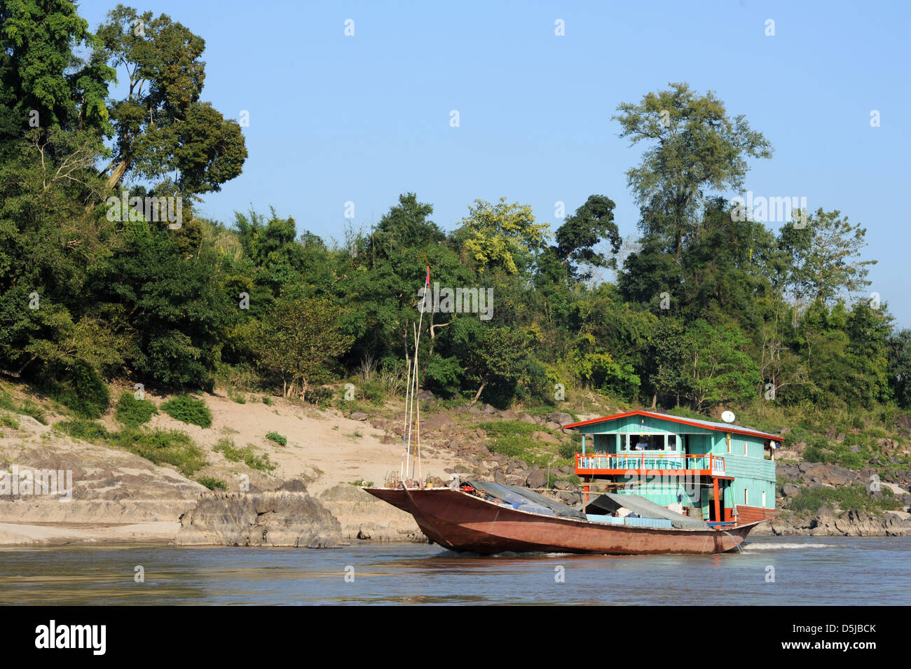 Merchant ship at river Mekong on Laos Stock Photo - Alamy