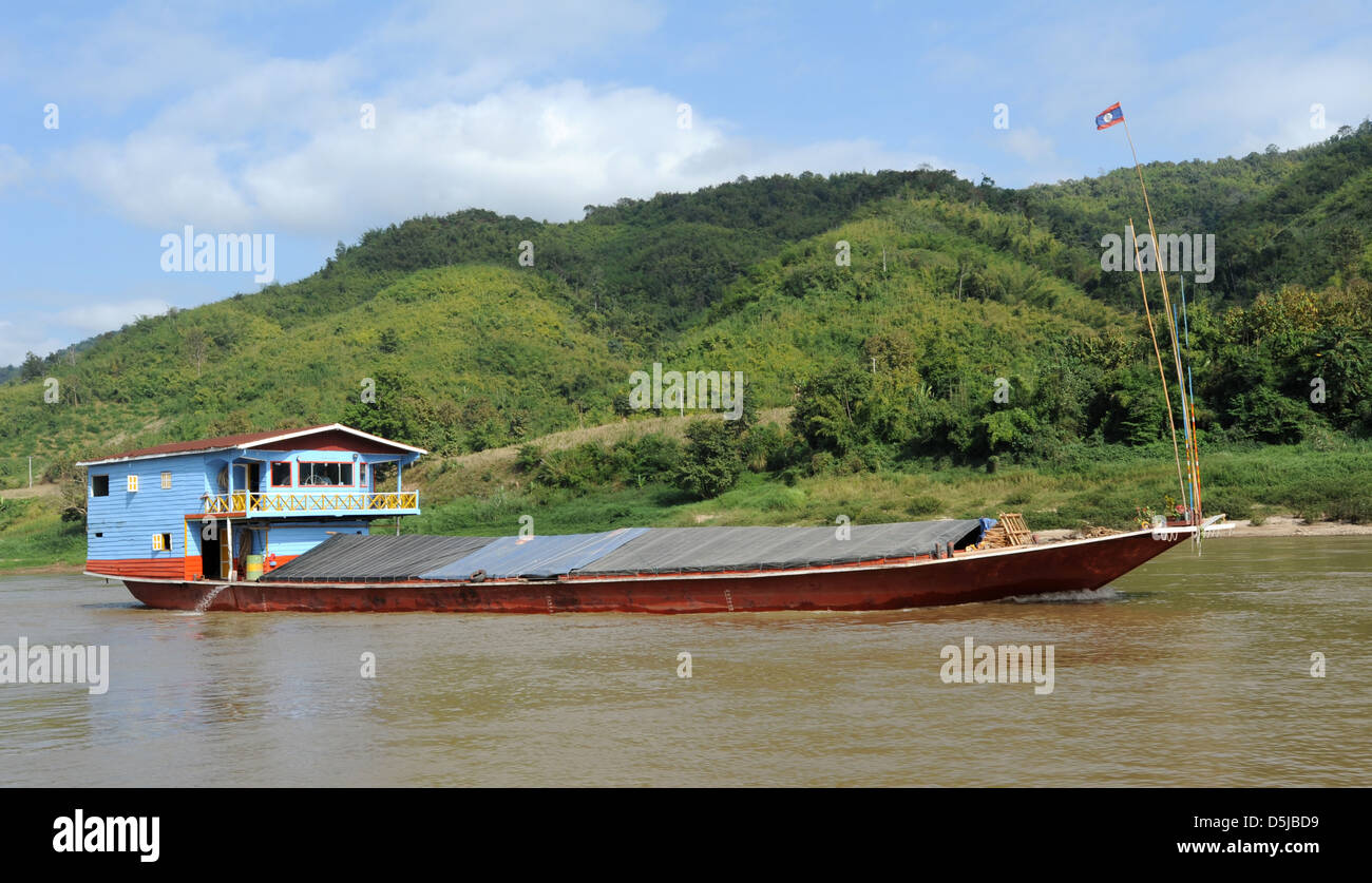 Merchant ship at river Mekong on Laos Stock Photo - Alamy